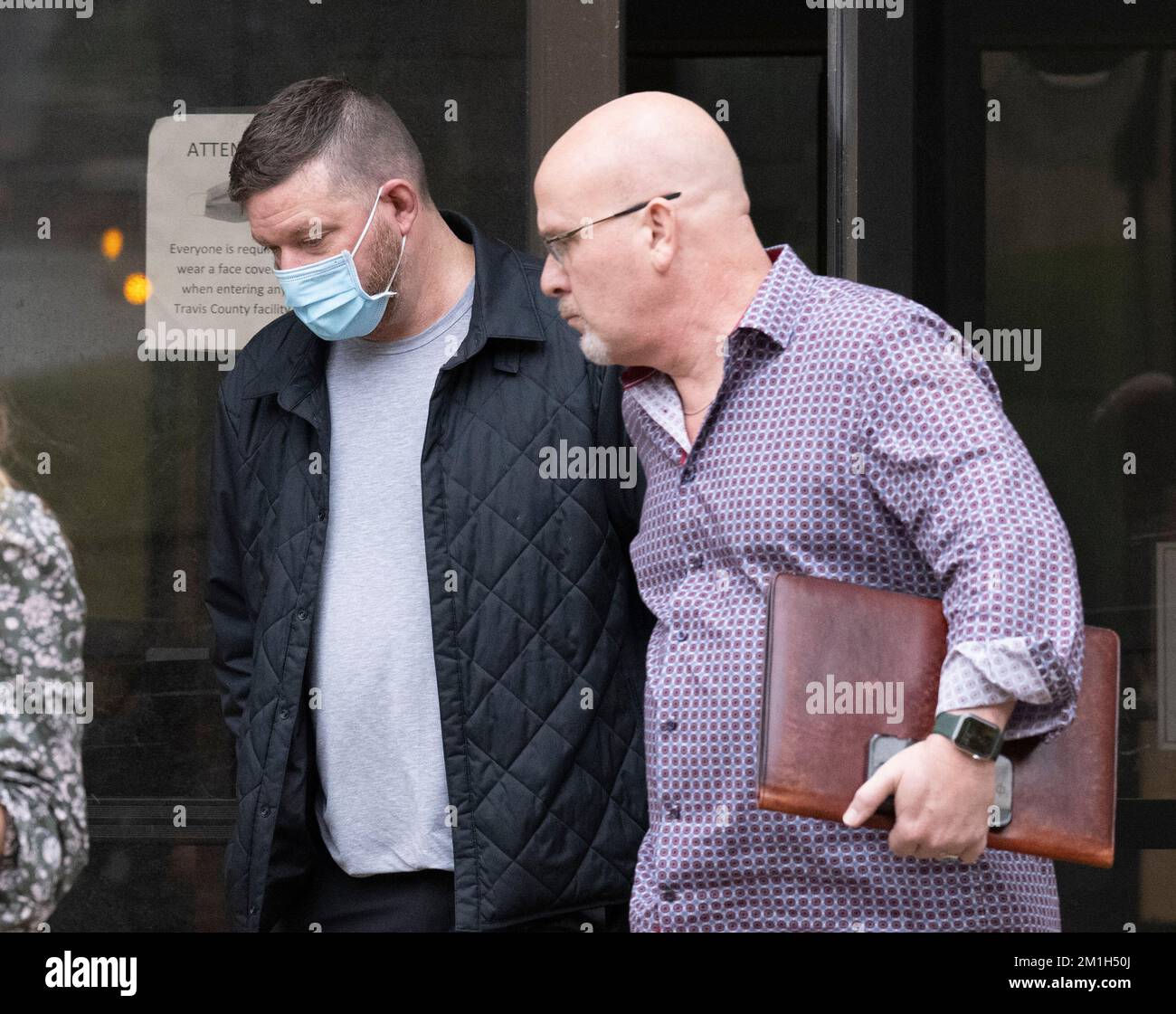 University of Texas men's basketball coach CHRIS BEARD (l) leaves the ...