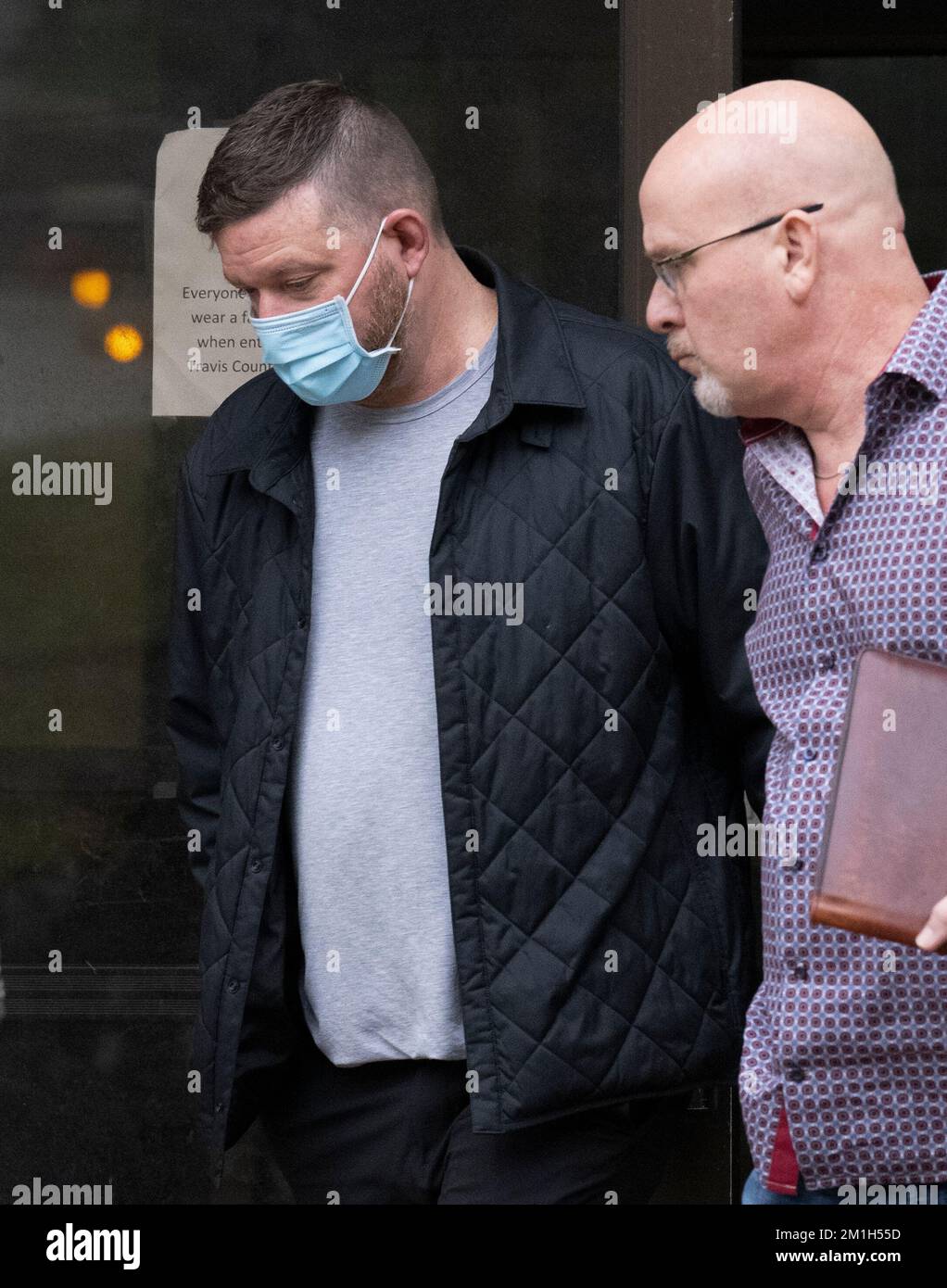 University of Texas men's basketball coach CHRIS BEARD (l) leaves the ...