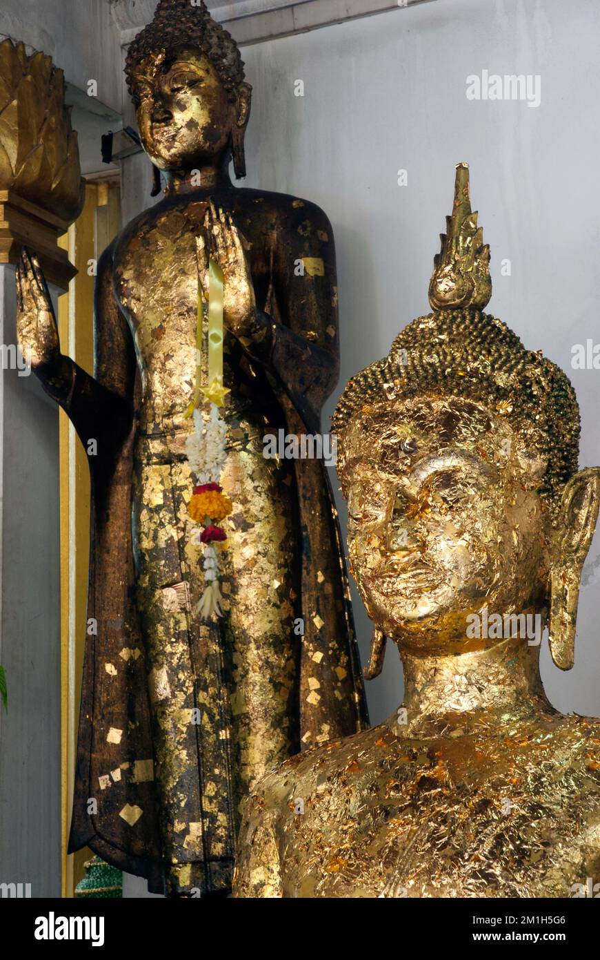 Group of Buddha on the interior walls of the ordination hall in Wat Na ...