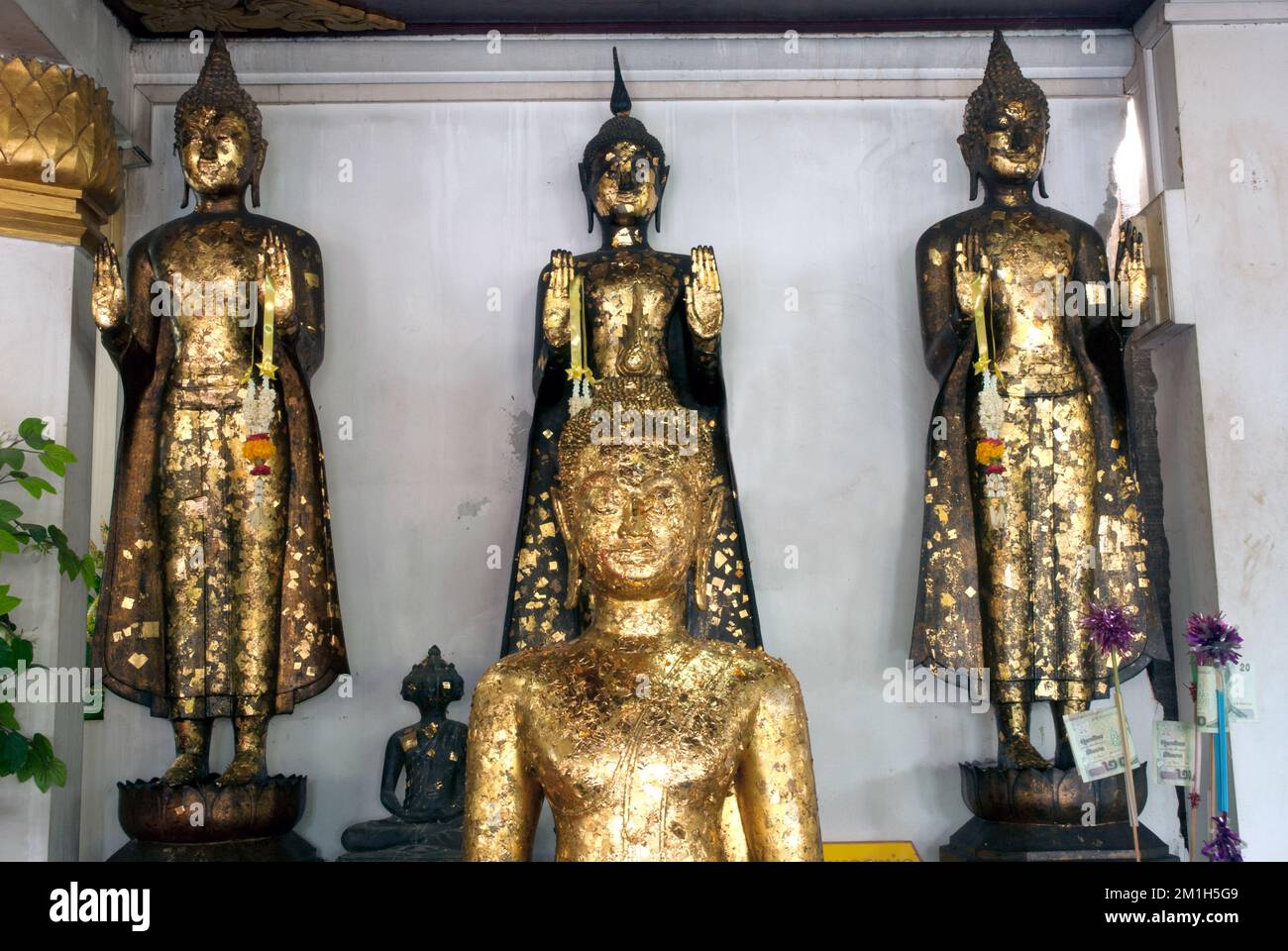 Group of Buddha on the interior walls of the ordination hall in Wat Na ...