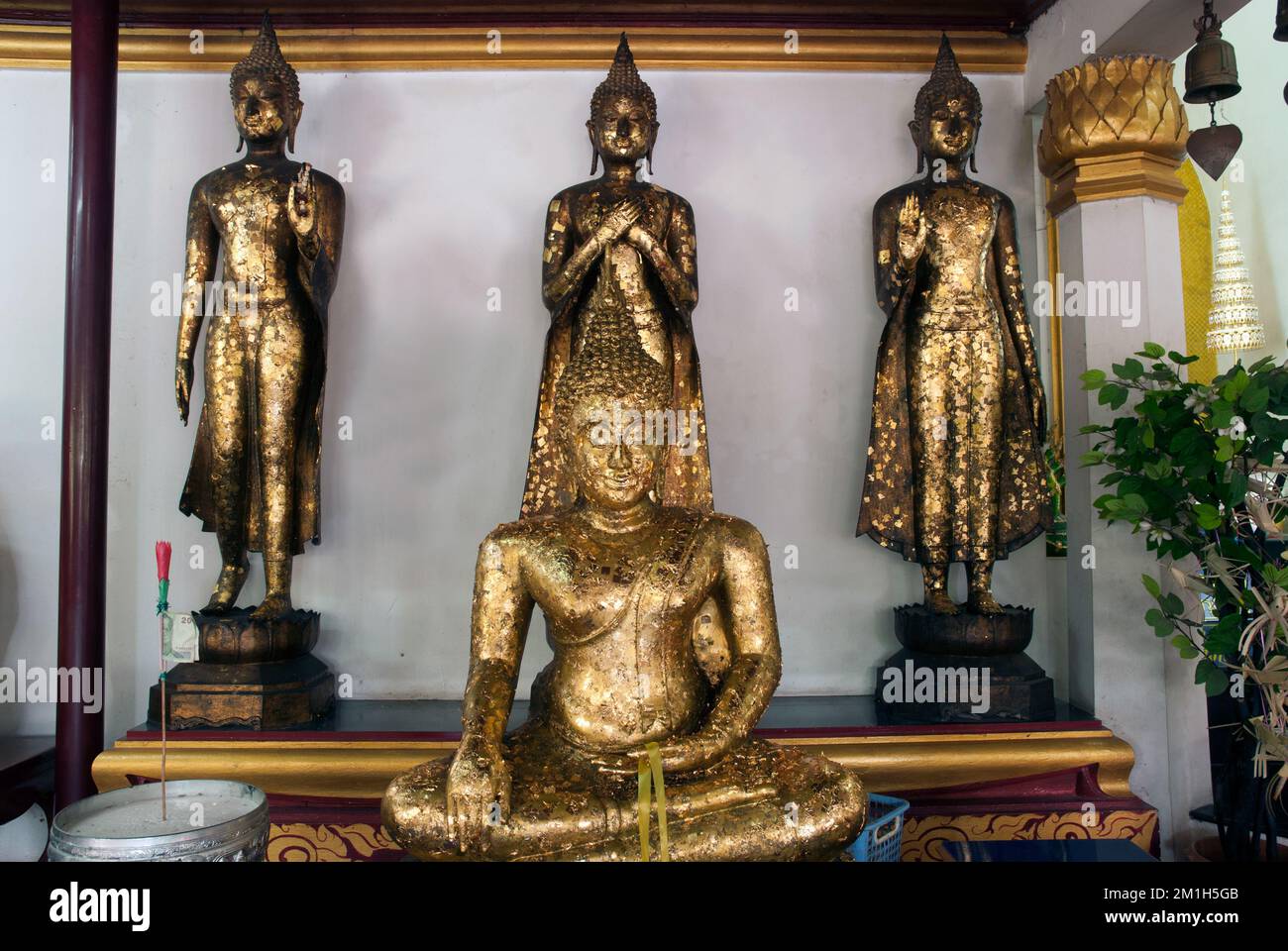 Group of Buddha on the interior walls of the ordination hall in Wat Na ...