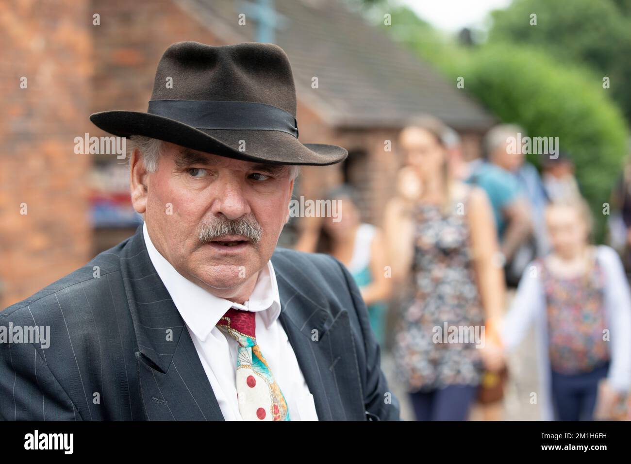 Man trilby suit hi-res stock photography and images - Alamy