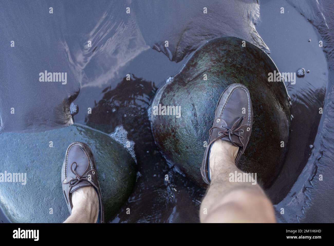 Feet on stones in water hi-res stock photography and images - Alamy