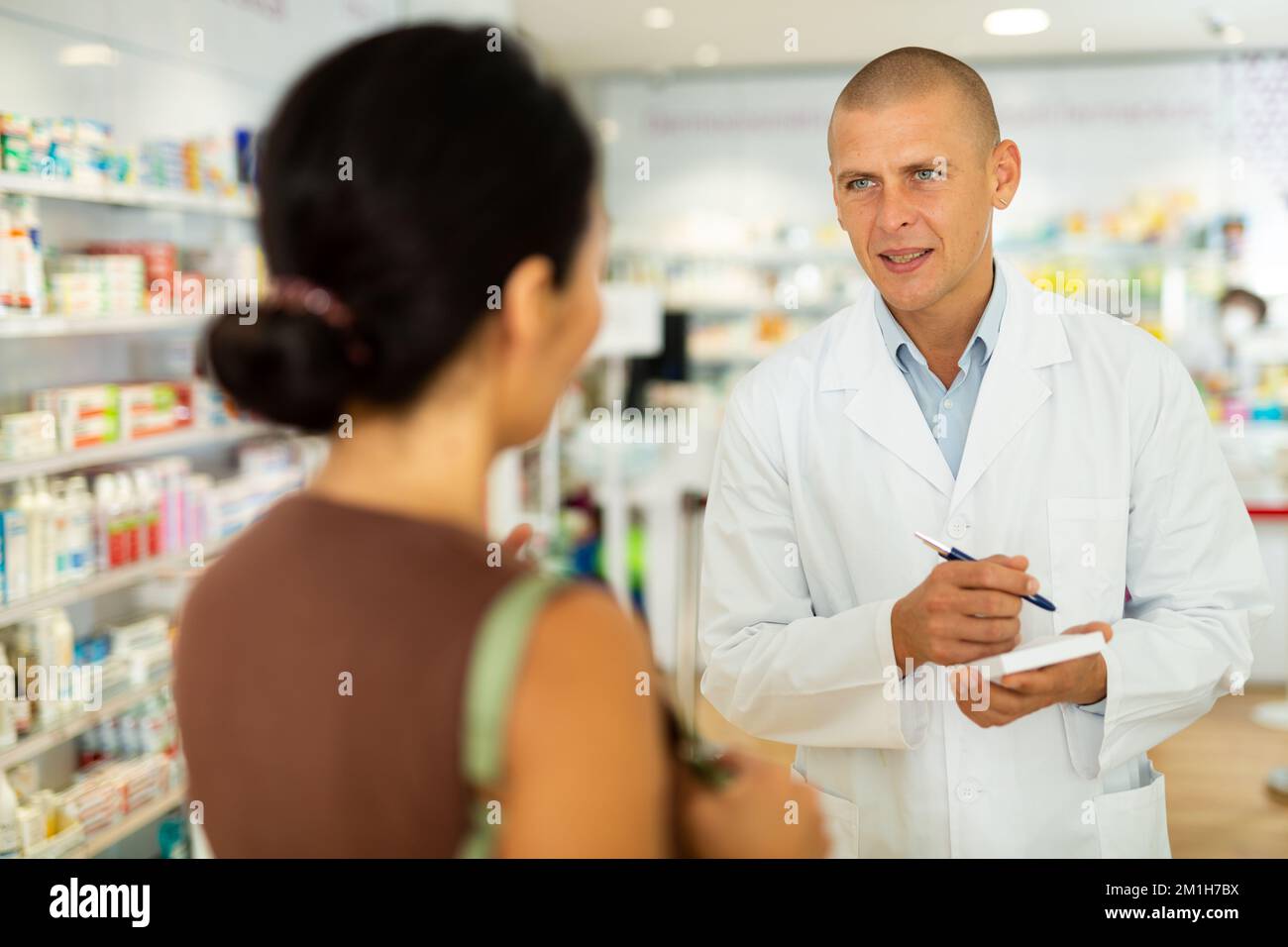 Caucasian male doctor writing hi-res stock photography and images - Alamy