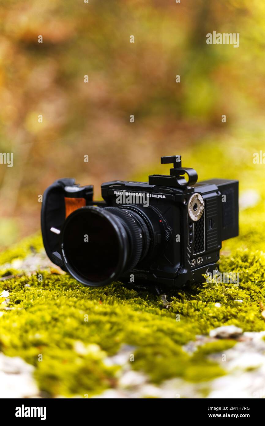Cinema camera on the mountain moss. Concept of cinematic gears shooting ...