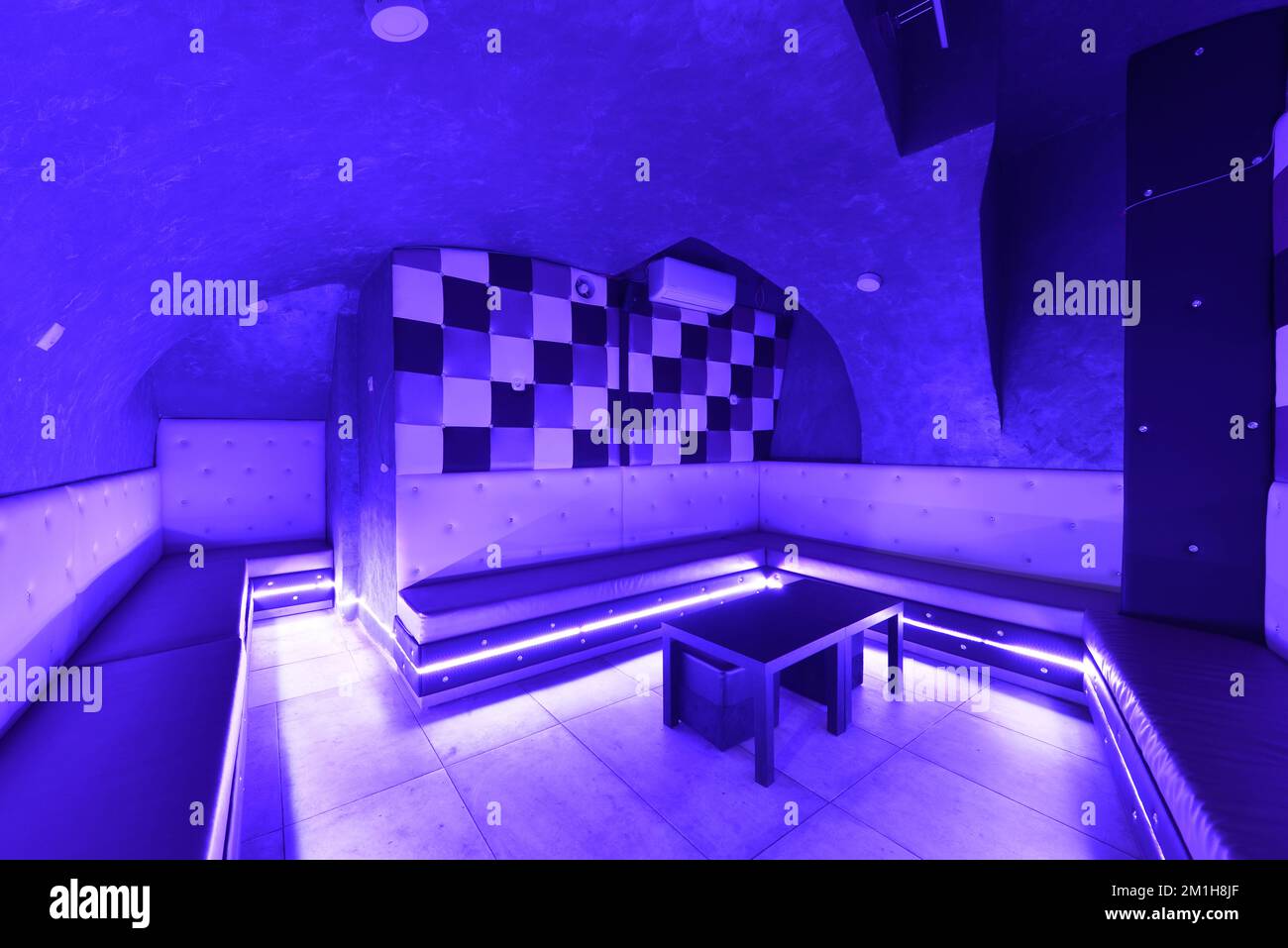 Entertainment room in a nightlife venue with rgb neon lights and ...