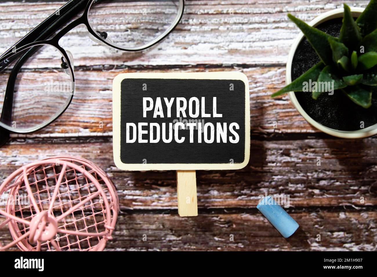 Selective focus.Calculator,pencil and banknotes with the word Payroll ...