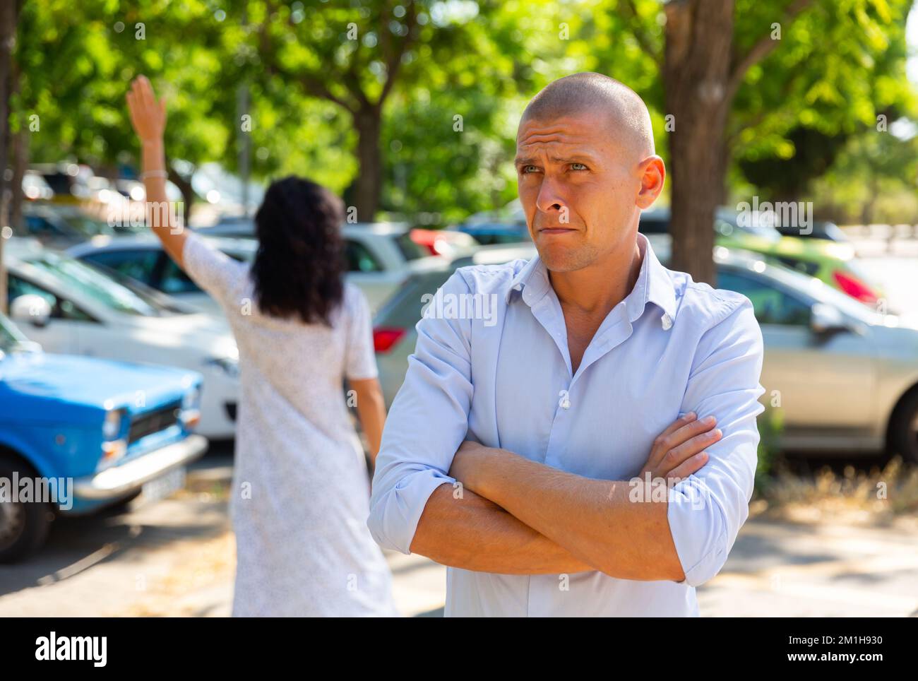 Angry couple having quarrel outside hi-res stock photography and images ...