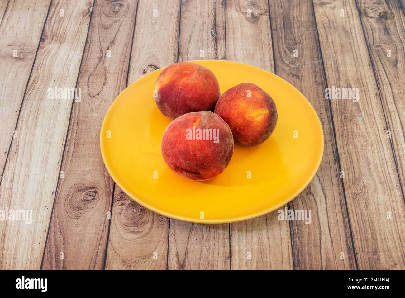 The peach contains a single seed enclosed in a hard shell, the stone ...