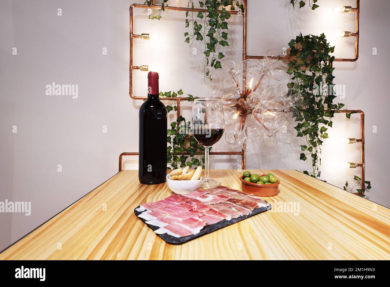A delicious and super typical Spanish tapa of knife-cut slices of acorn ...