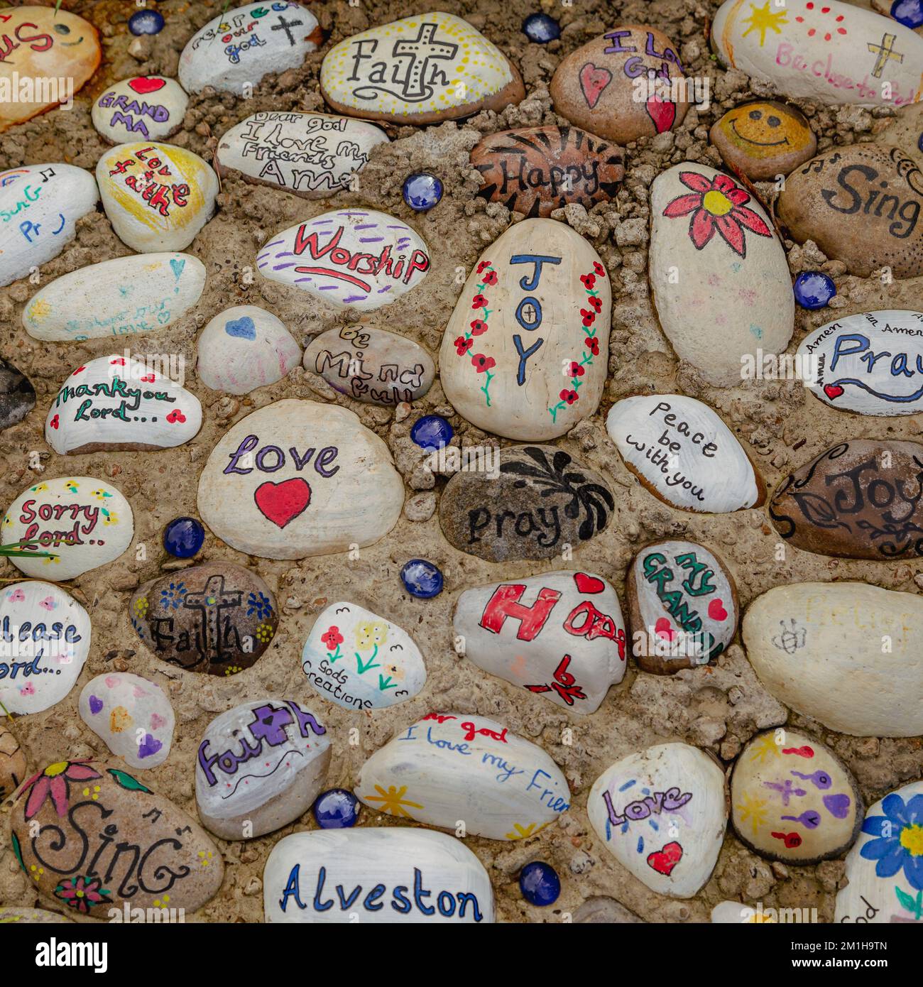Hand painted stones in the grounds of St. James Church in Alveston ...