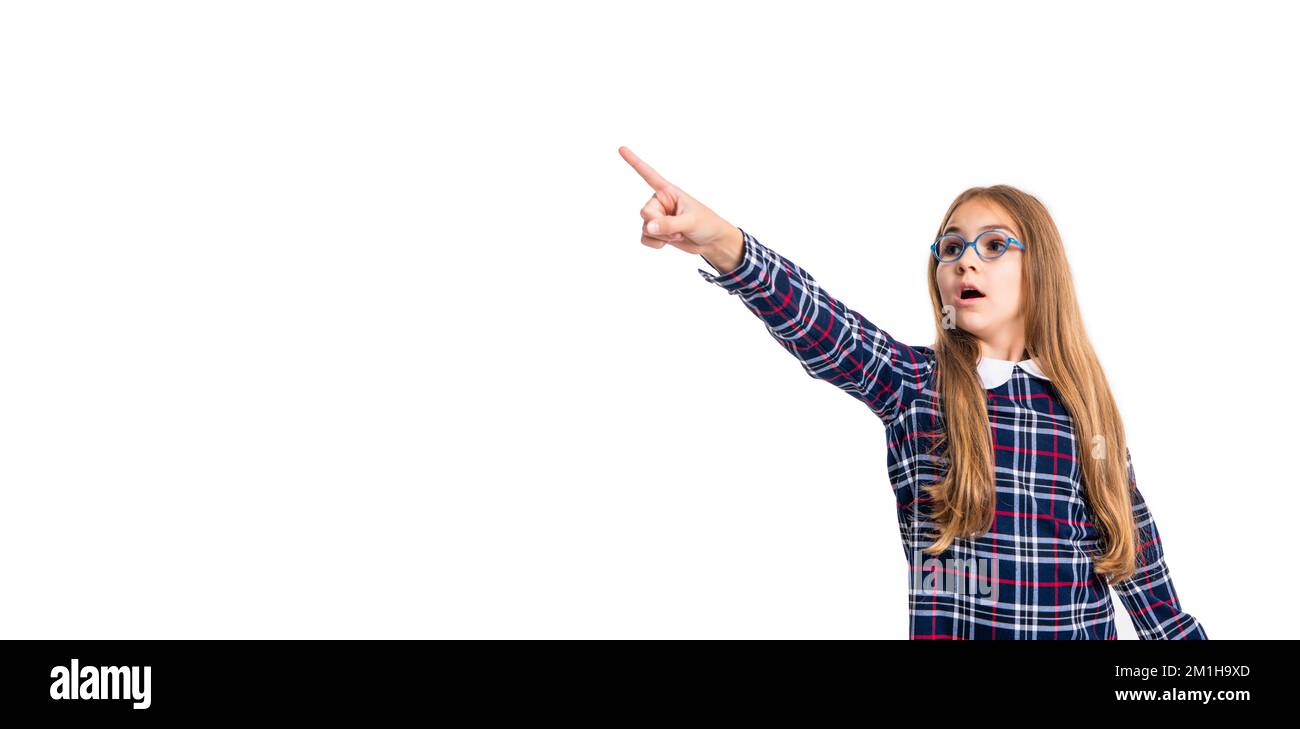teen girl in school uniform and eyewear pointing finger isolated on ...