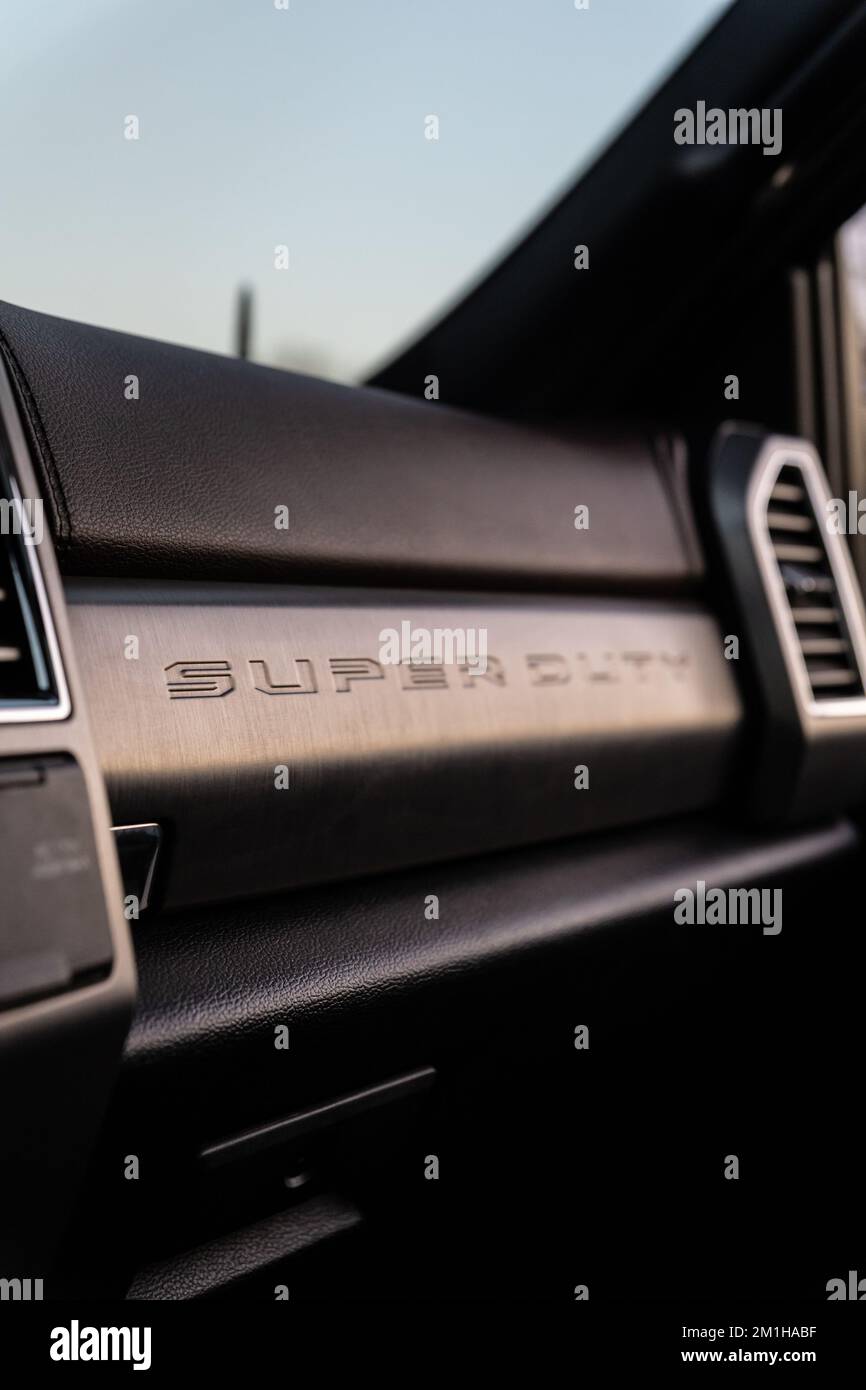 A vertical closeup of the inside front of a lifted 2017 Ford F350 ...
