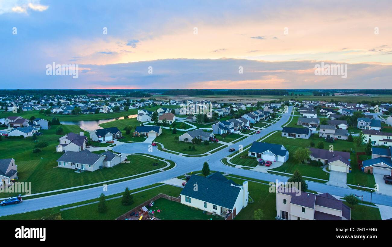 Midwest American suburban neighborhood housing aerial at dusk Stock ...
