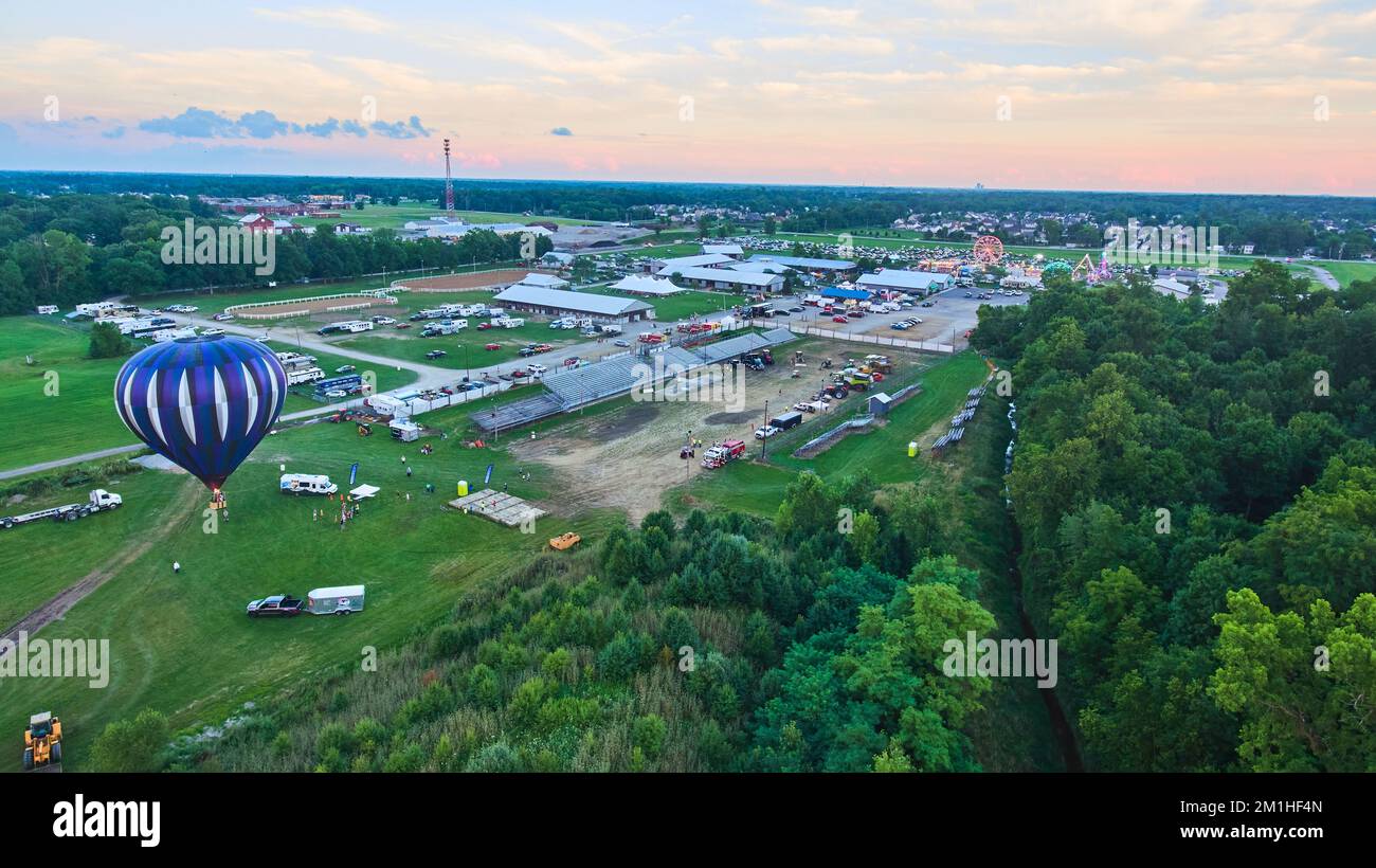 Allen County Fair in Indiana at dusk with blue hot air balloon Stock ...