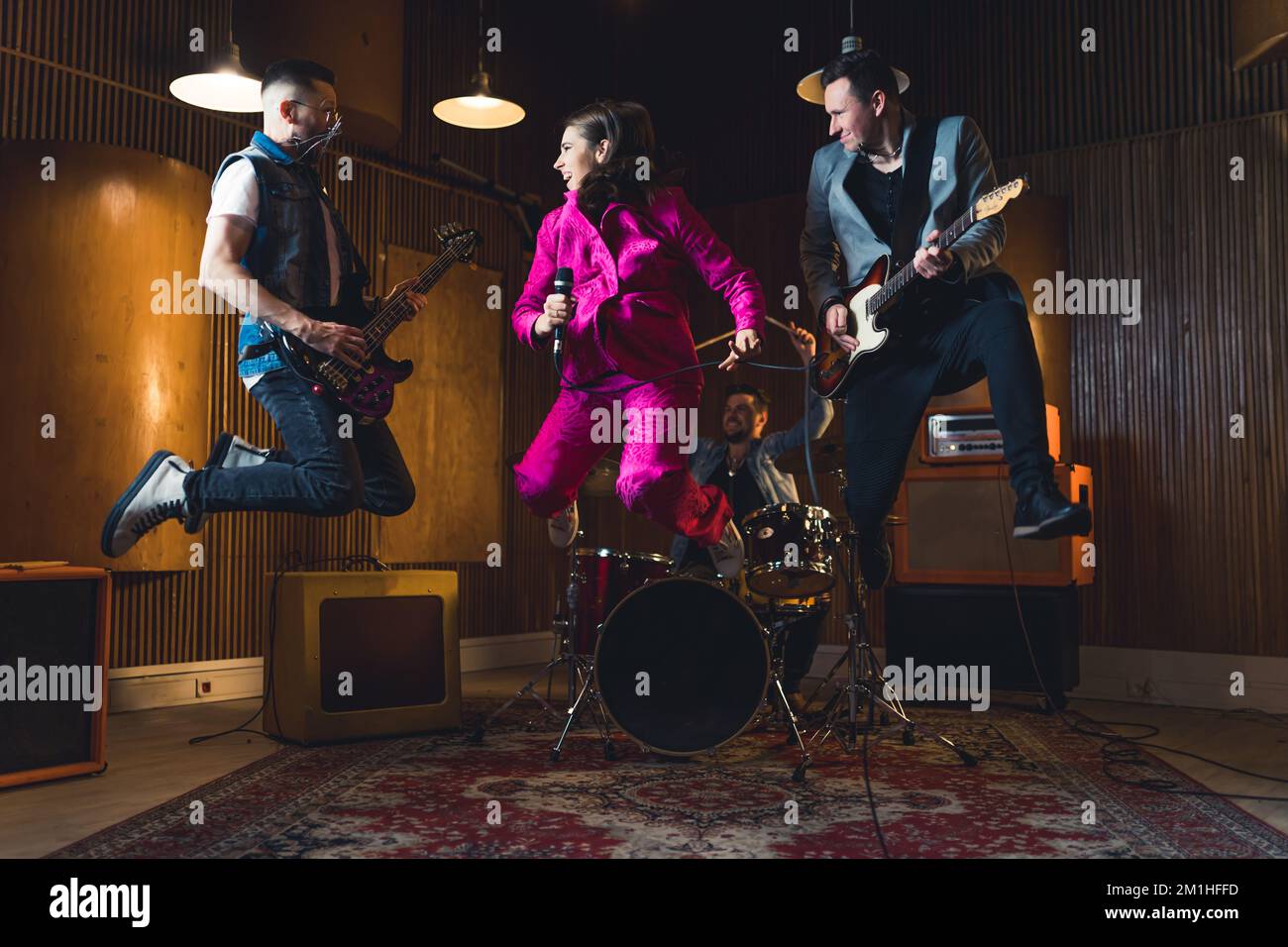 Band two men one woman hi-res stock photography and images - Alamy