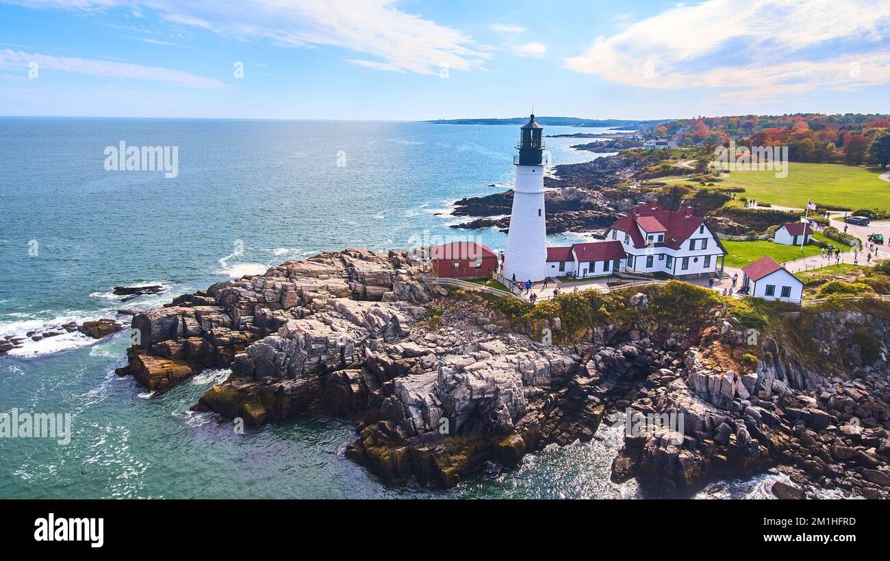 Aerial view of Maine coastline with rocky cliffs and iconic white ...