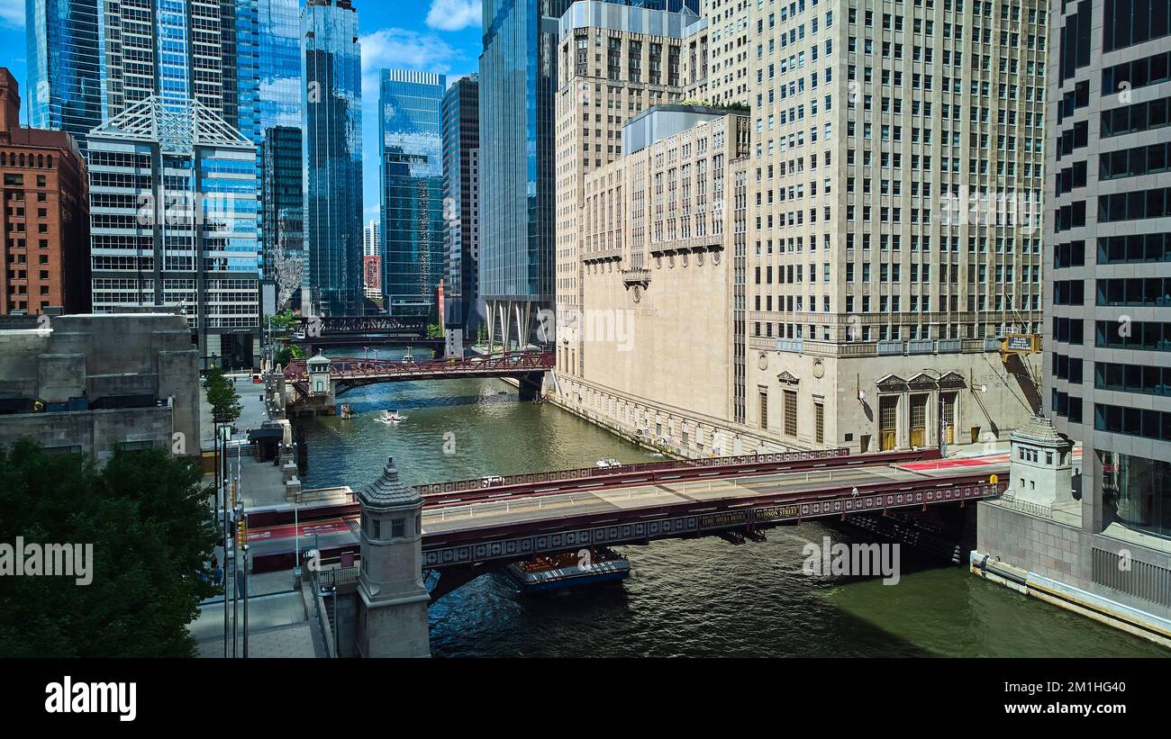 Chicago river ship canal with multiple bridges and reflective glass ...
