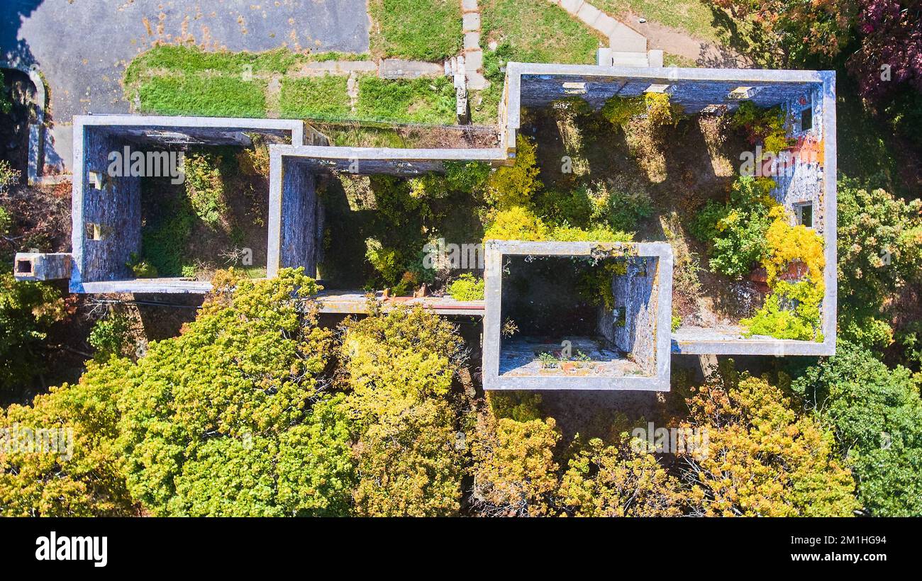 Aerial looking straight down on old abandoned stone building with empty ...