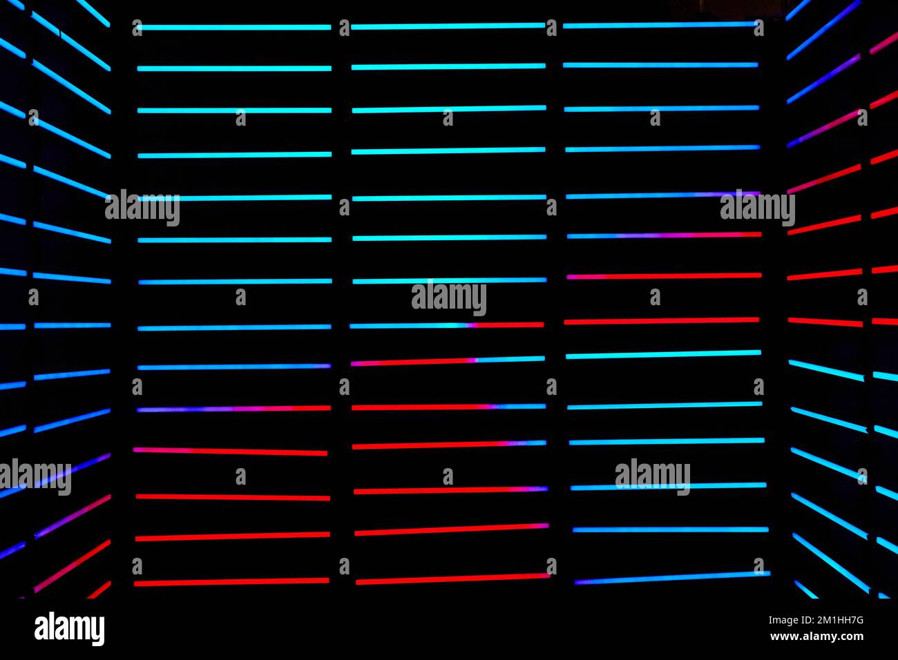 Abstract dark room with horizontal LED poles in blue and red Stock ...