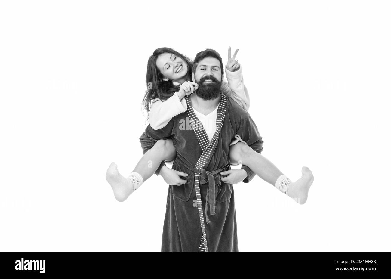 You win my love. Man give piggyback ride to woman showing V sign ...