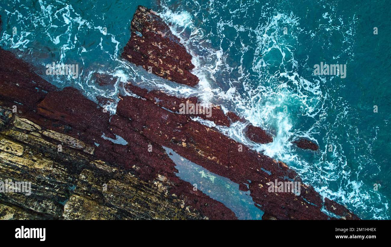 Tide pools off Maine coast from above with waves and rocks Stock Photo ...