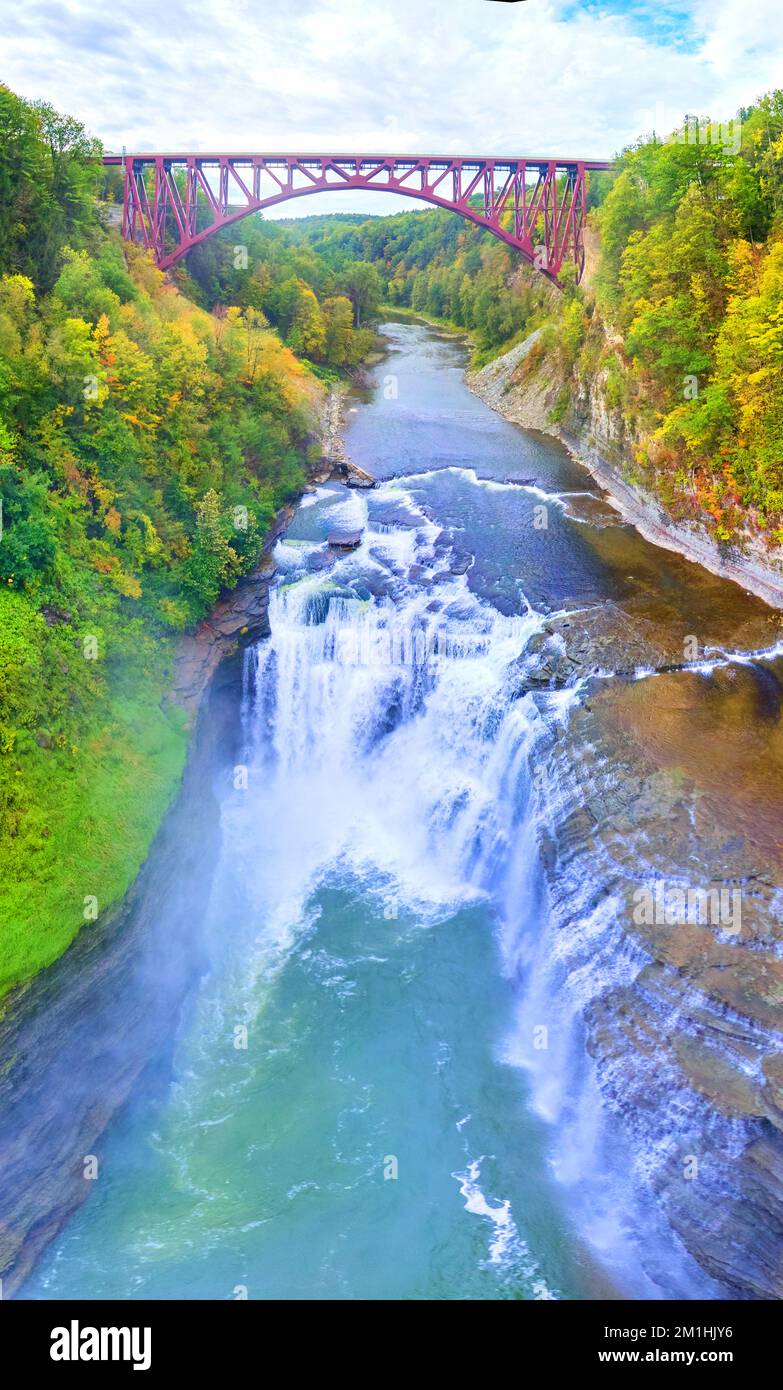 Aerial panorama vertical over stunning canyon with raging waterfalls ...