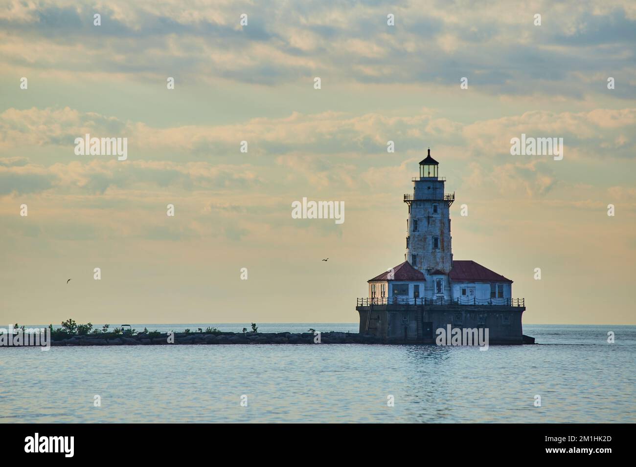 Chicago lake Lighthouse from Navy Pier during sunrise Stock Photo - Alamy