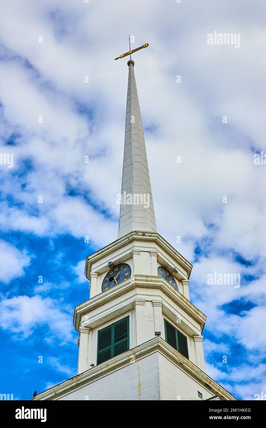 Detail of classic white steeple Christian church looking up from below ...