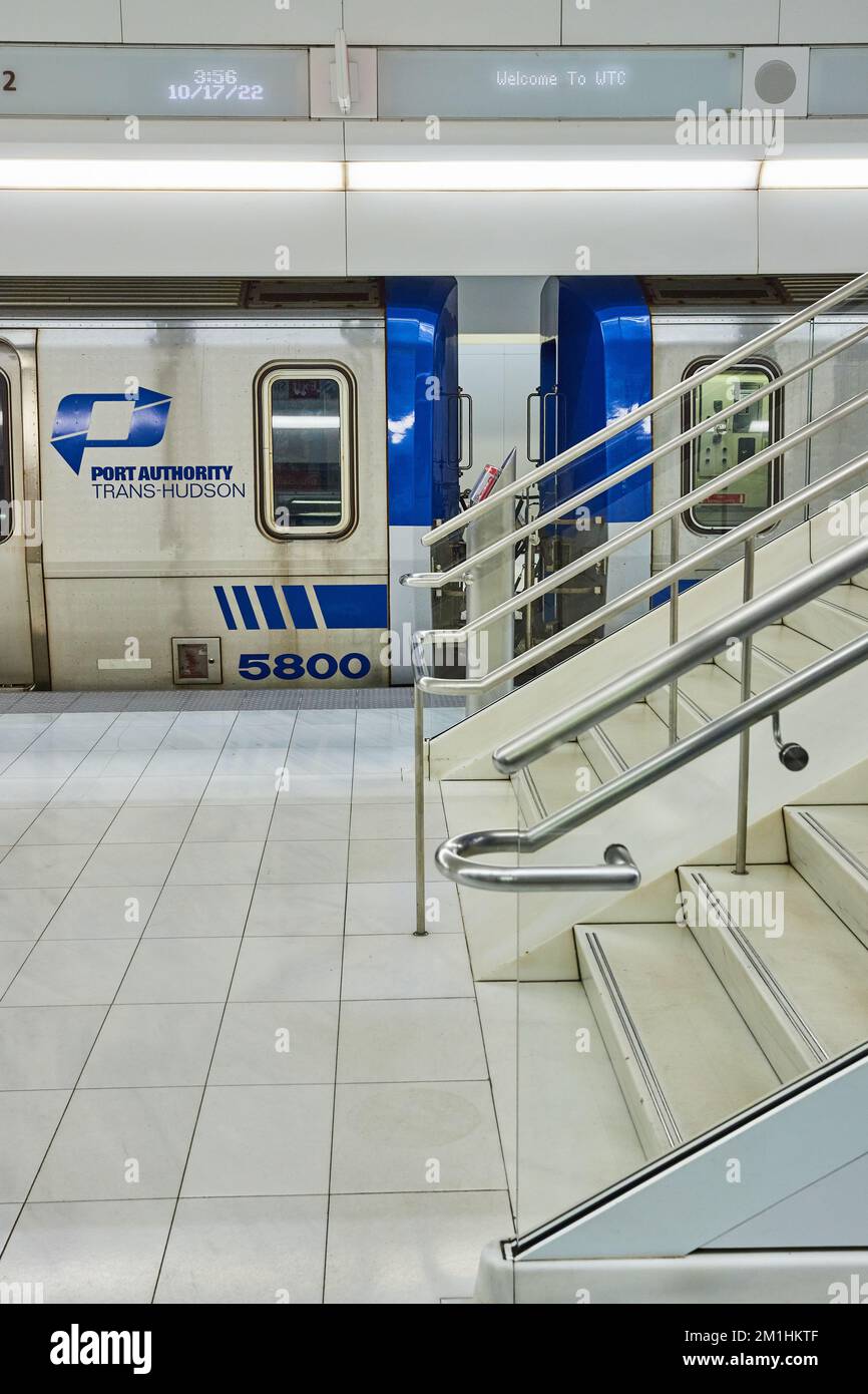 Clean modern subway train stairs up from side and Port Authority Trans ...