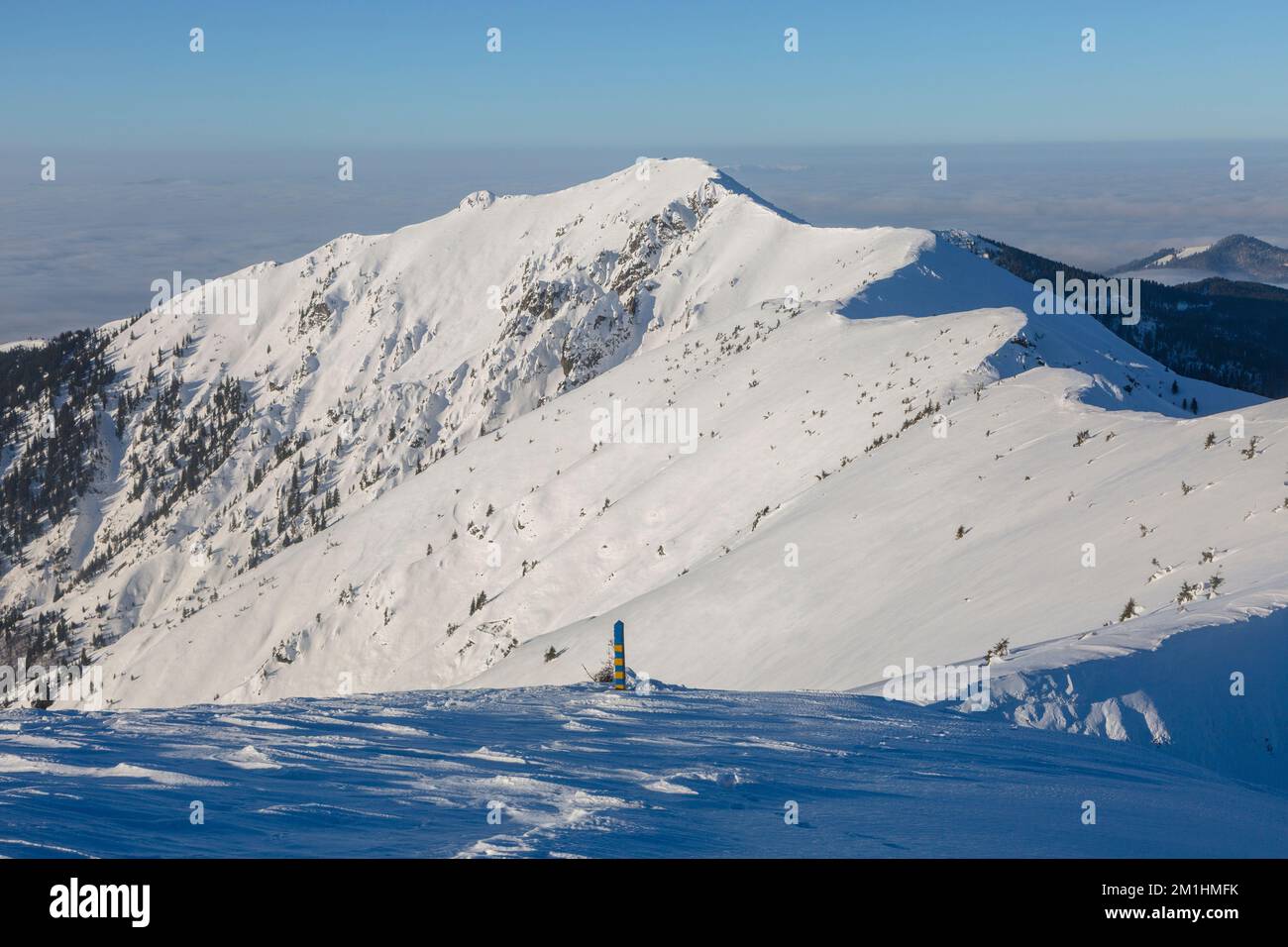 The border between two countries in the snow-capped mountains ...
