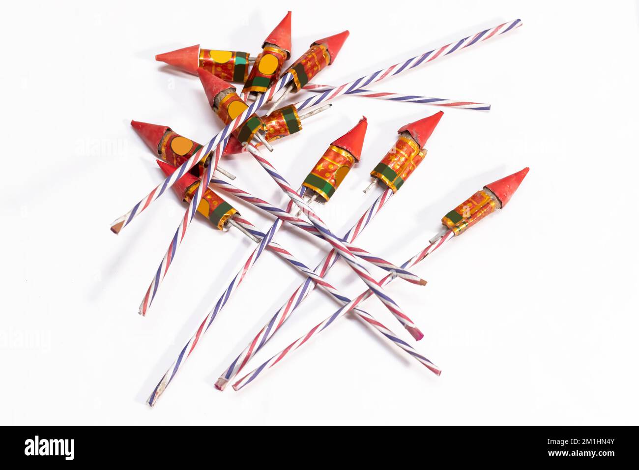 Pile of colorful fireworks rockets isolated on white background Stock ...