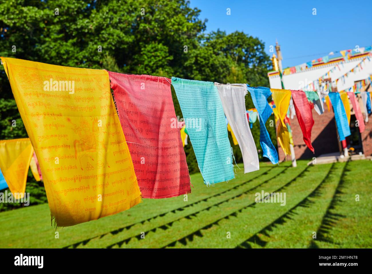 Tibetan Mongolian Buddhist Cultural Center with colorful prayer flags ...