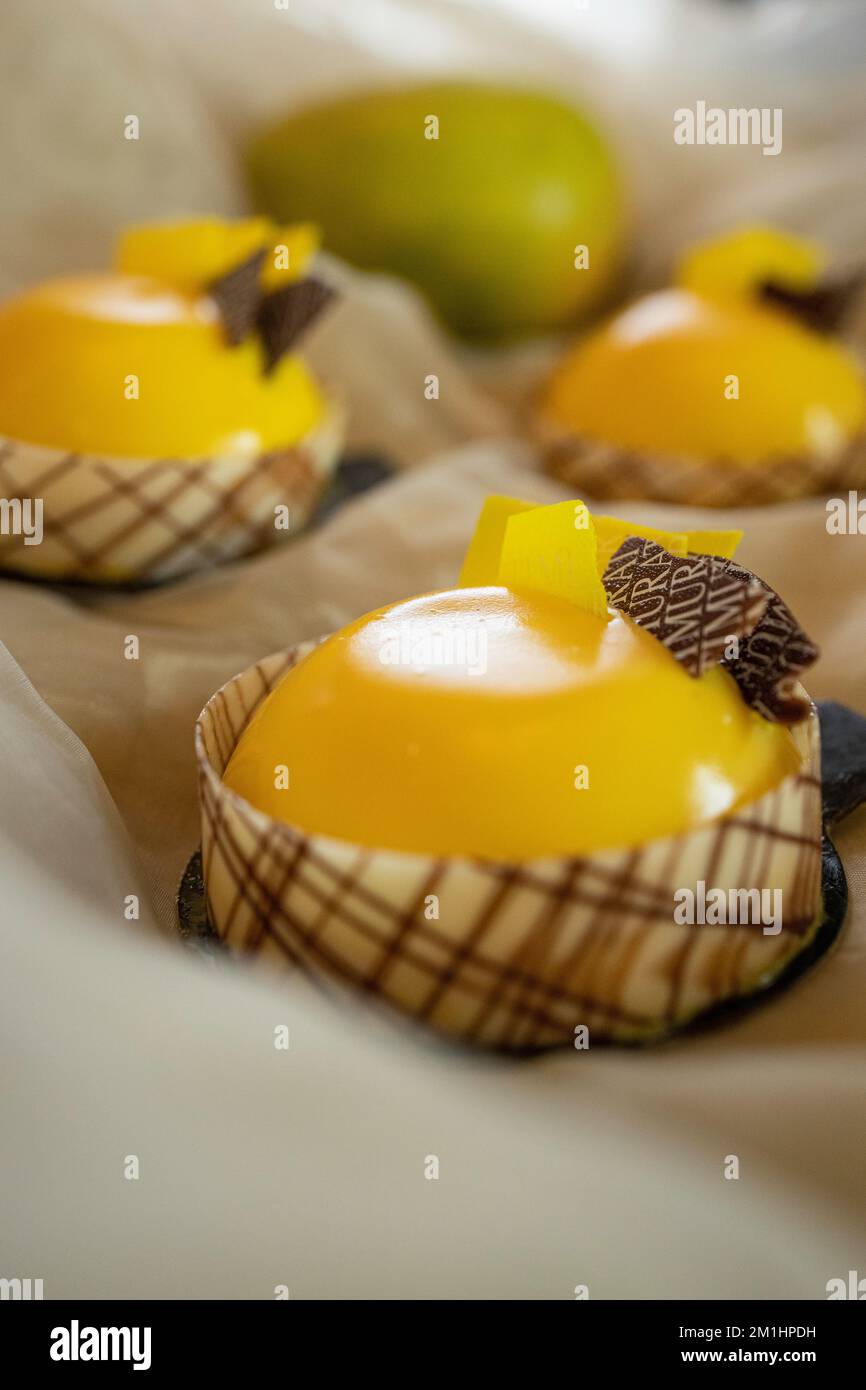 mango ganache dessert with white chocolate Stock Photo - Alamy