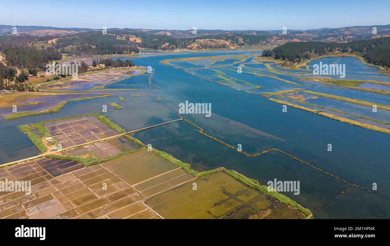 Aerial shot of Salinas de Cáhuil and Laguna Cáhuil (Pichilemu) - Chile ...