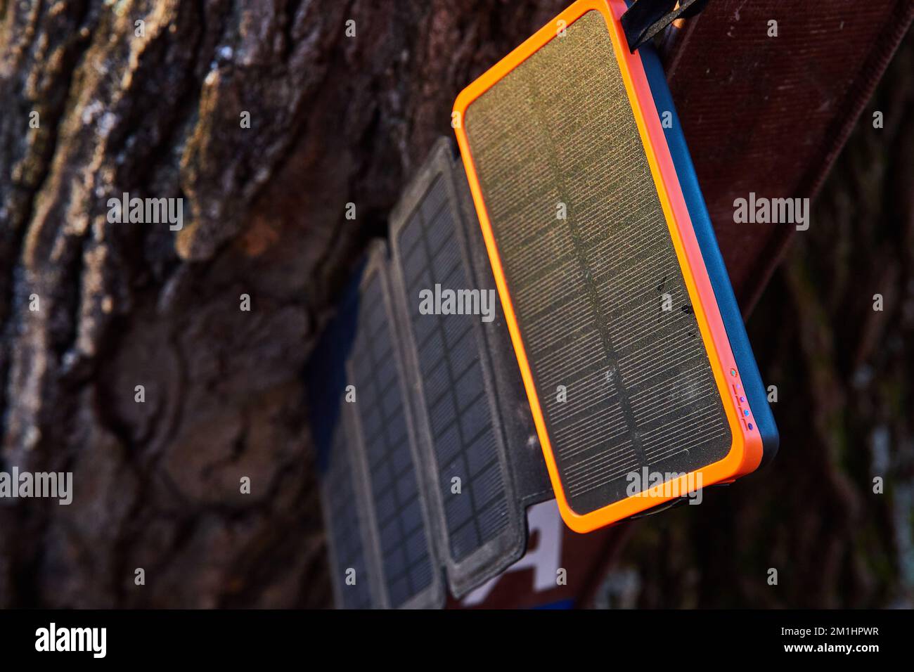 Detail of portable solar panel unit for phones charging in the sun by ...