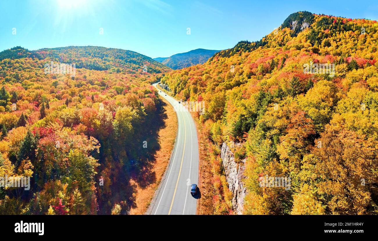 Highways of New Hampshire during peak fall going through mountains of ...