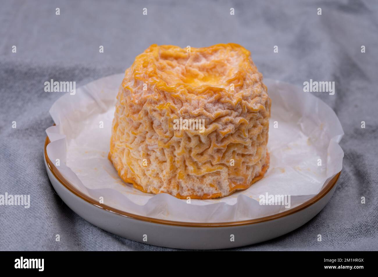 French Langres soft cows crumbly cheese with washed rind structure made ...
