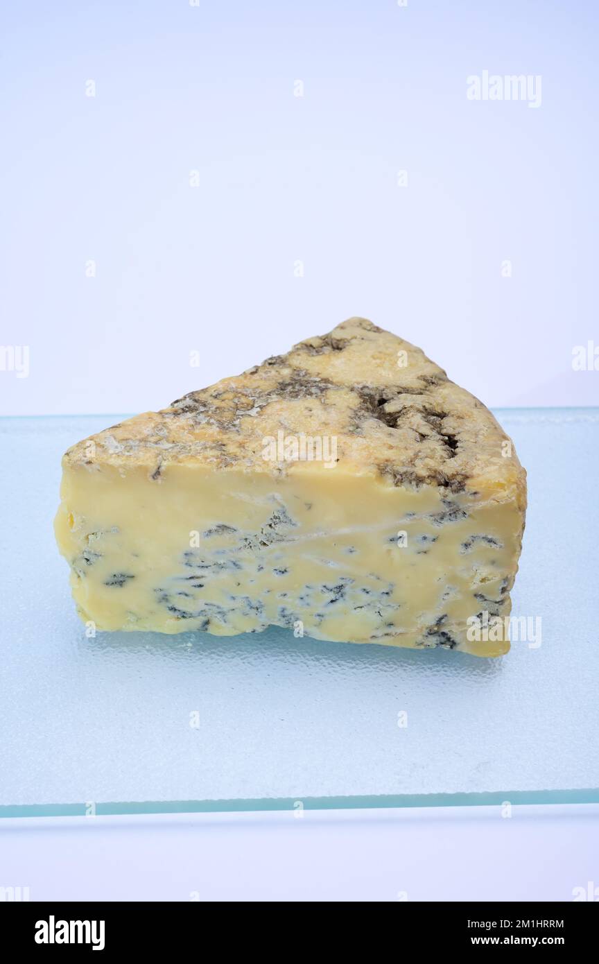 Cheese collection, piece of English old stilton blue cheese close up ...