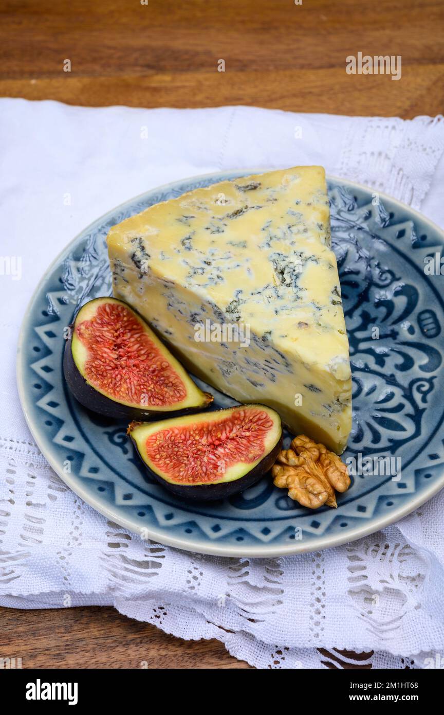 Cheese collection, English old stilton blue cheese close up served with ...