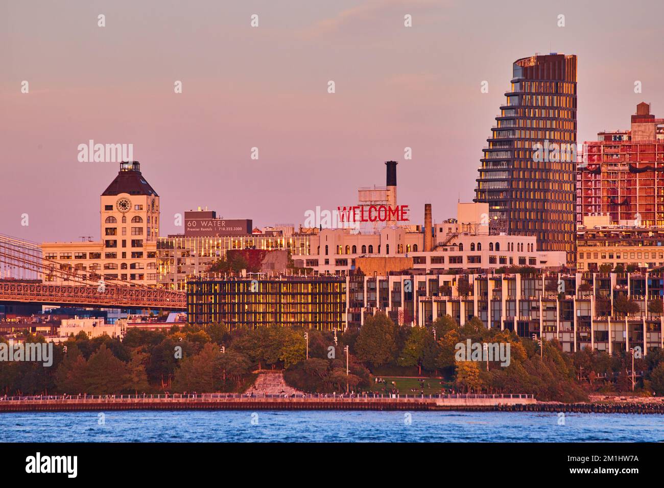 WELCOME sign on building of Brooklyn from coast with waters and ...