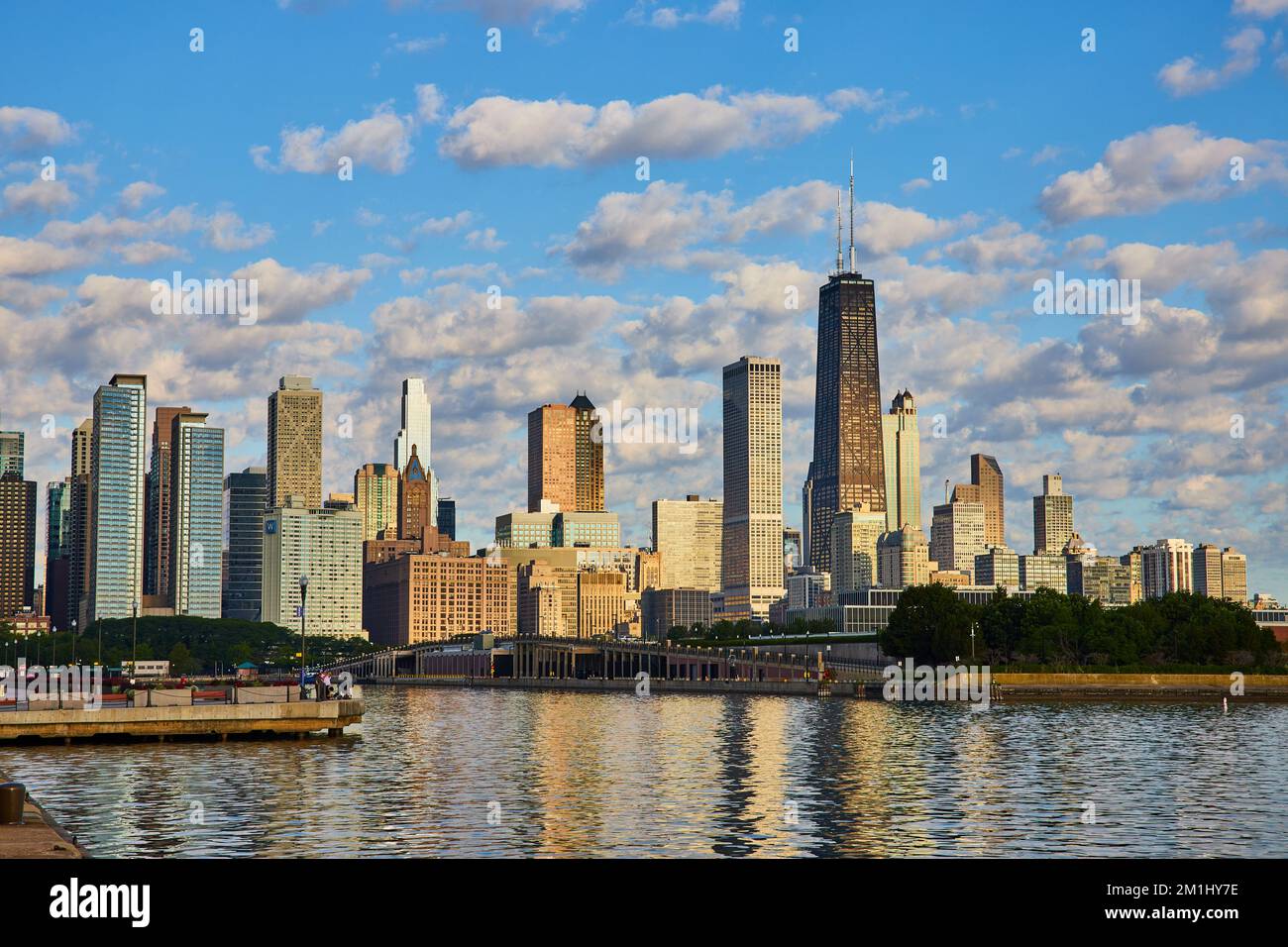 Chicago skyline in morning light on Lake Michigan Stock Photo - Alamy