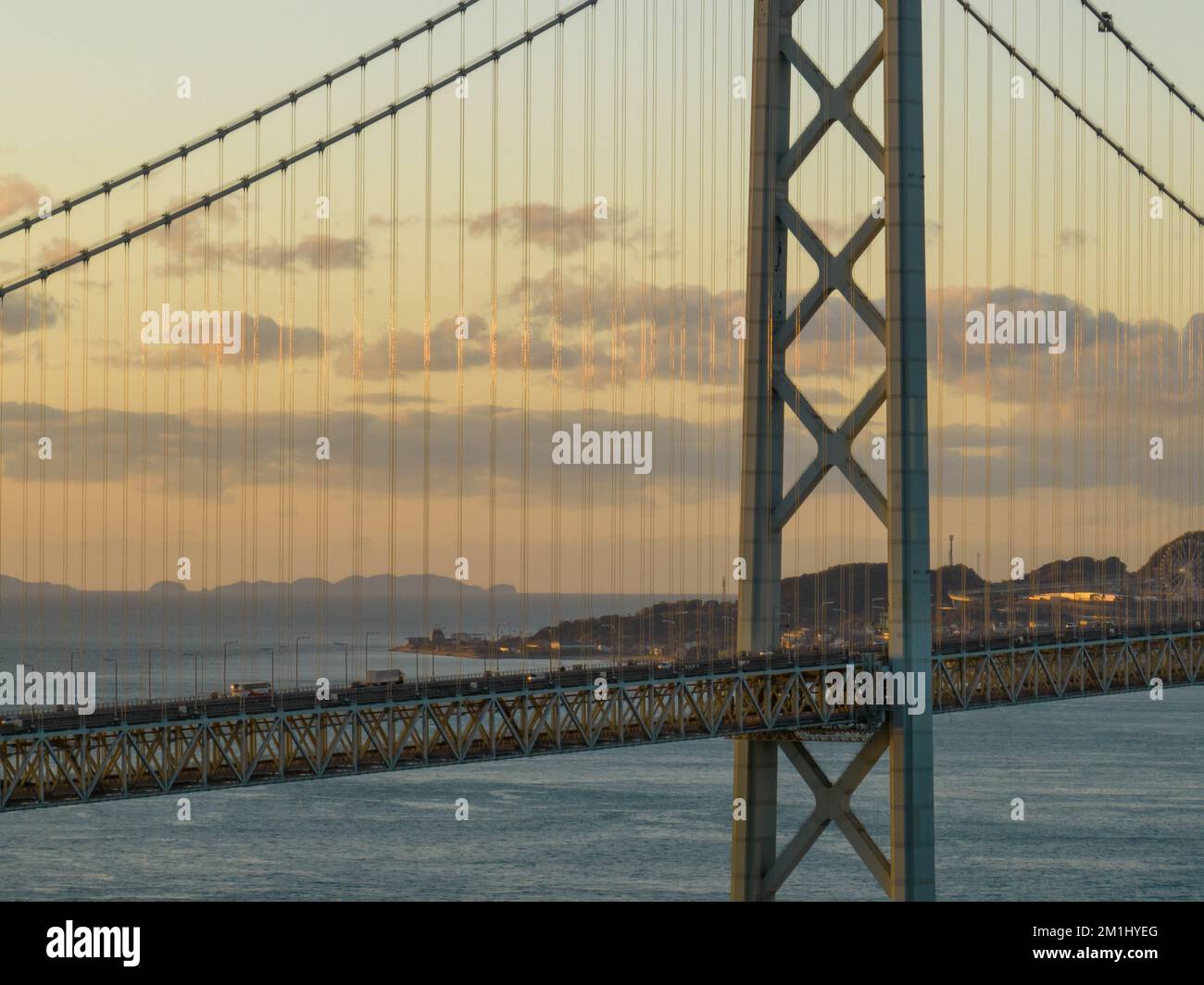 Sunset drive on suspension bridge hi-res stock photography and images ...