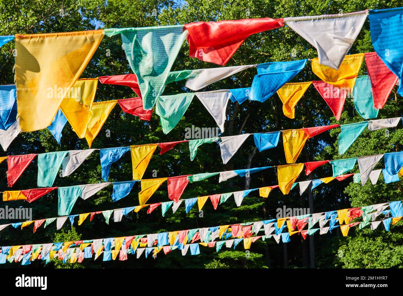 Rows and rows of colorful prayer flags for Tibetan Mongolian Buddhist ...
