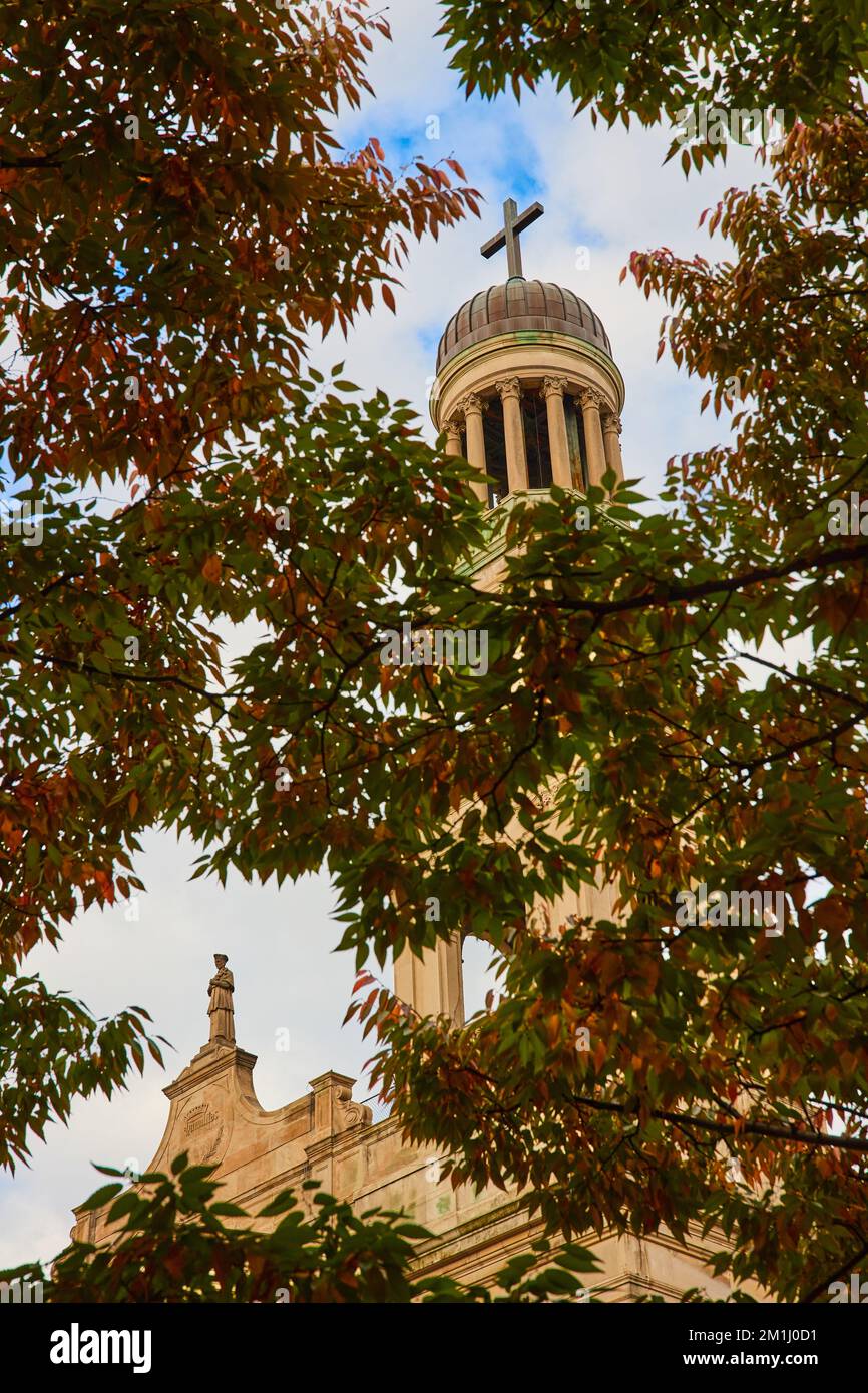 Christian Church steeple through fall trees in New York City Stock ...