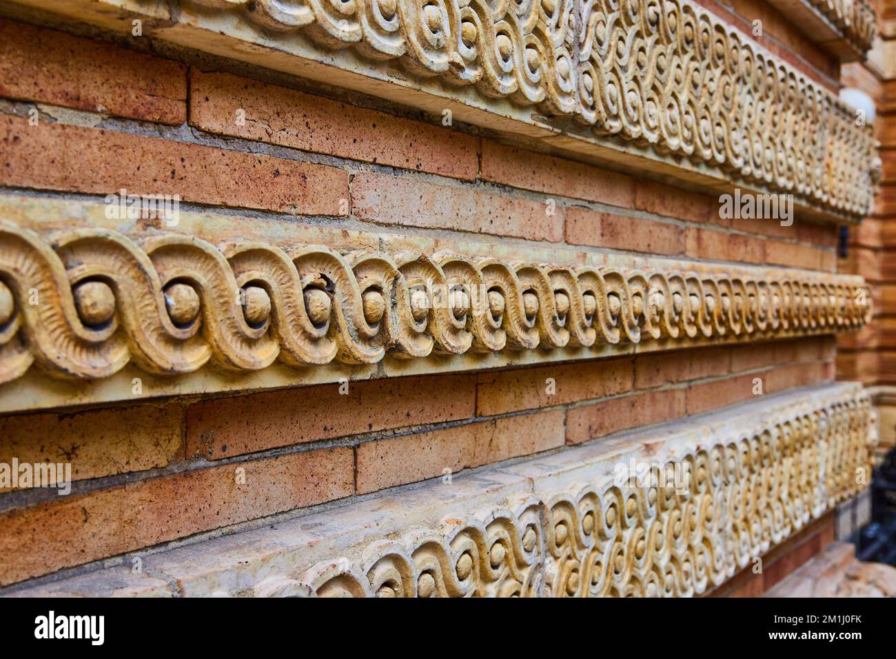 Angle looking down wall up close with detailed limestone work Stock ...