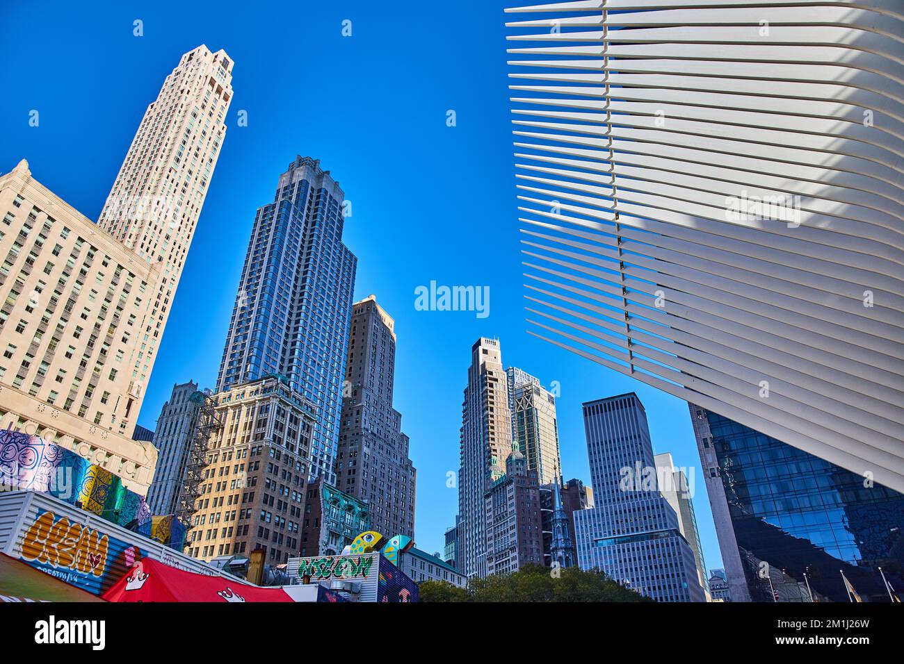 White spike rib architecture surrounded by New York City skyscrapers ...