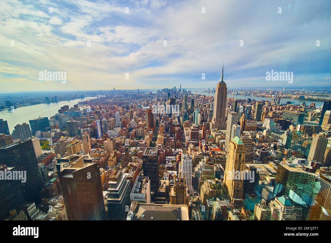 Stunning Manhattan overlook high up wide angle showing all of New York ...