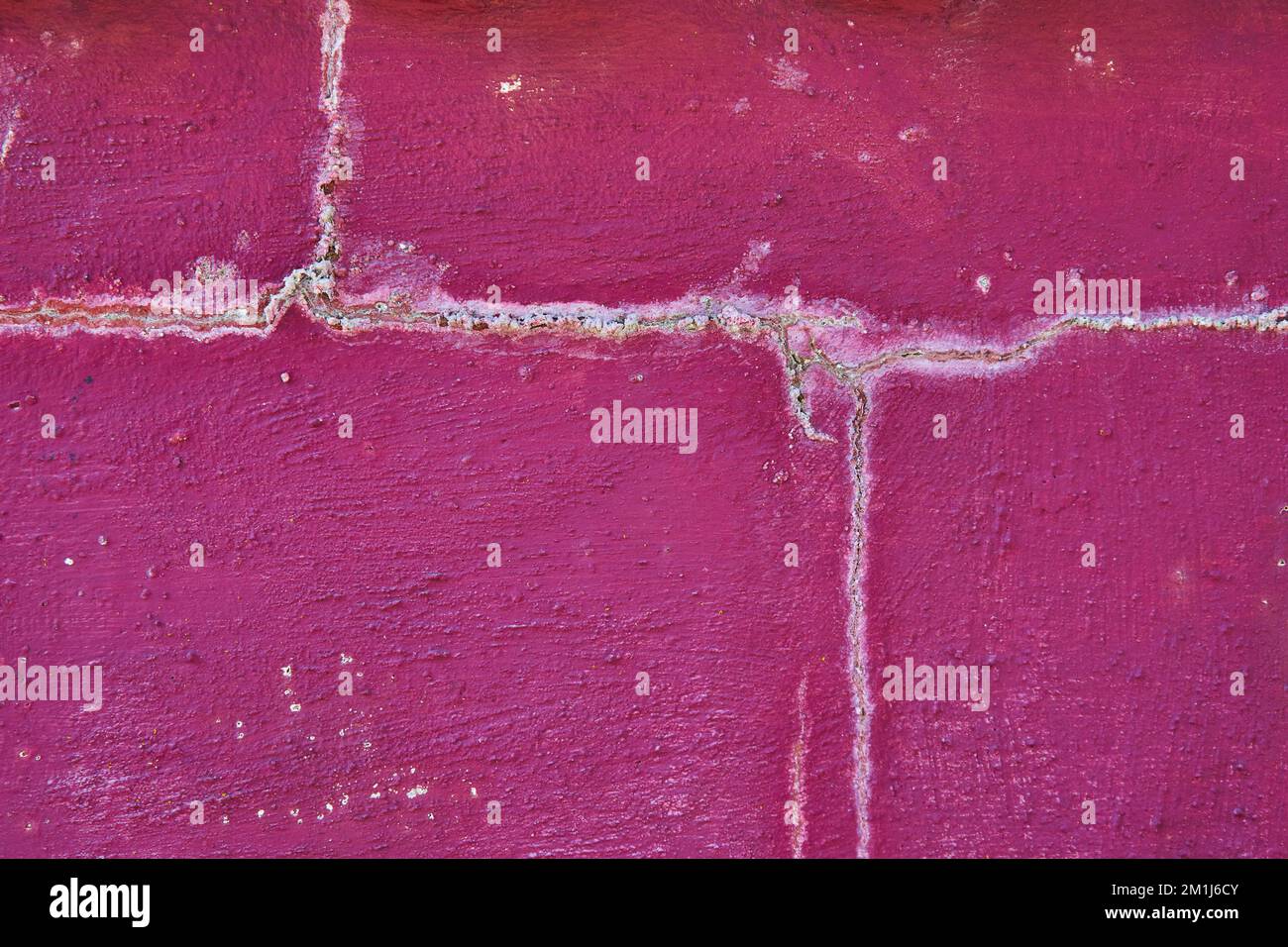 Red cement block wall texture asset with cracks Stock Photo - Alamy