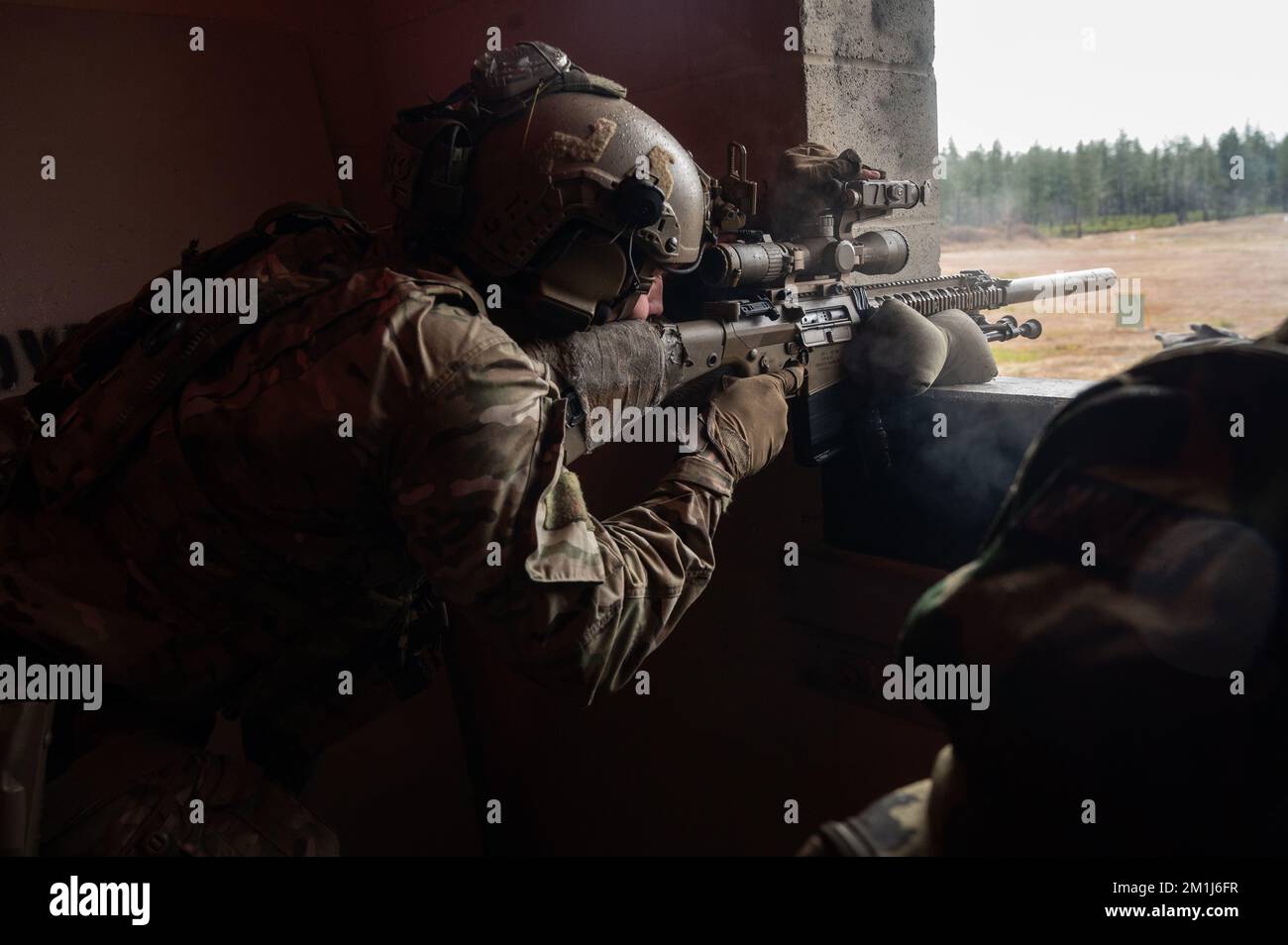 A team of Green Berets from 1st Special Forces Group (Airborne) fire at ...